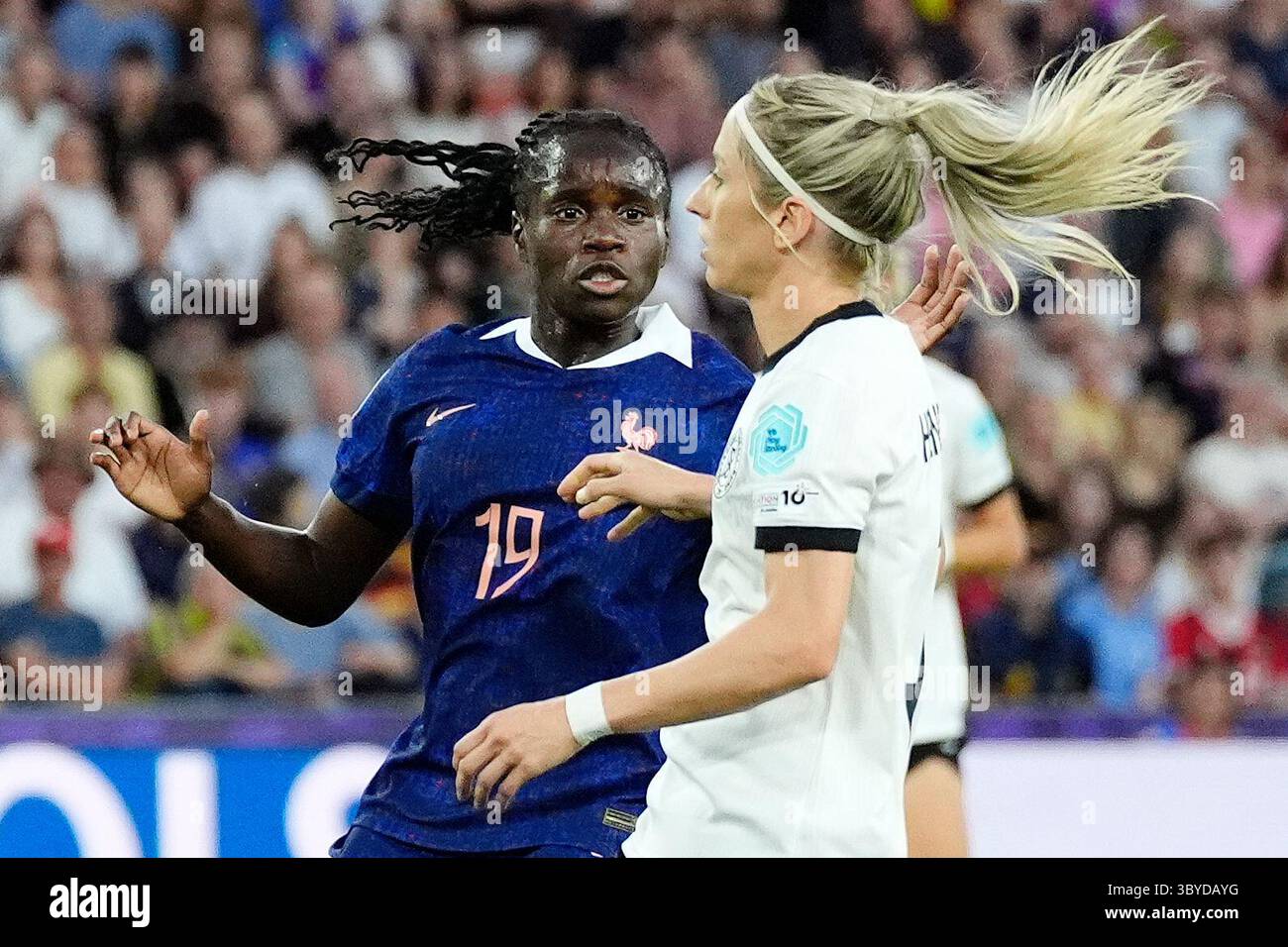 Germany's Kathrin Hendrich (right) and France's Griedge Mbock Bathy ...