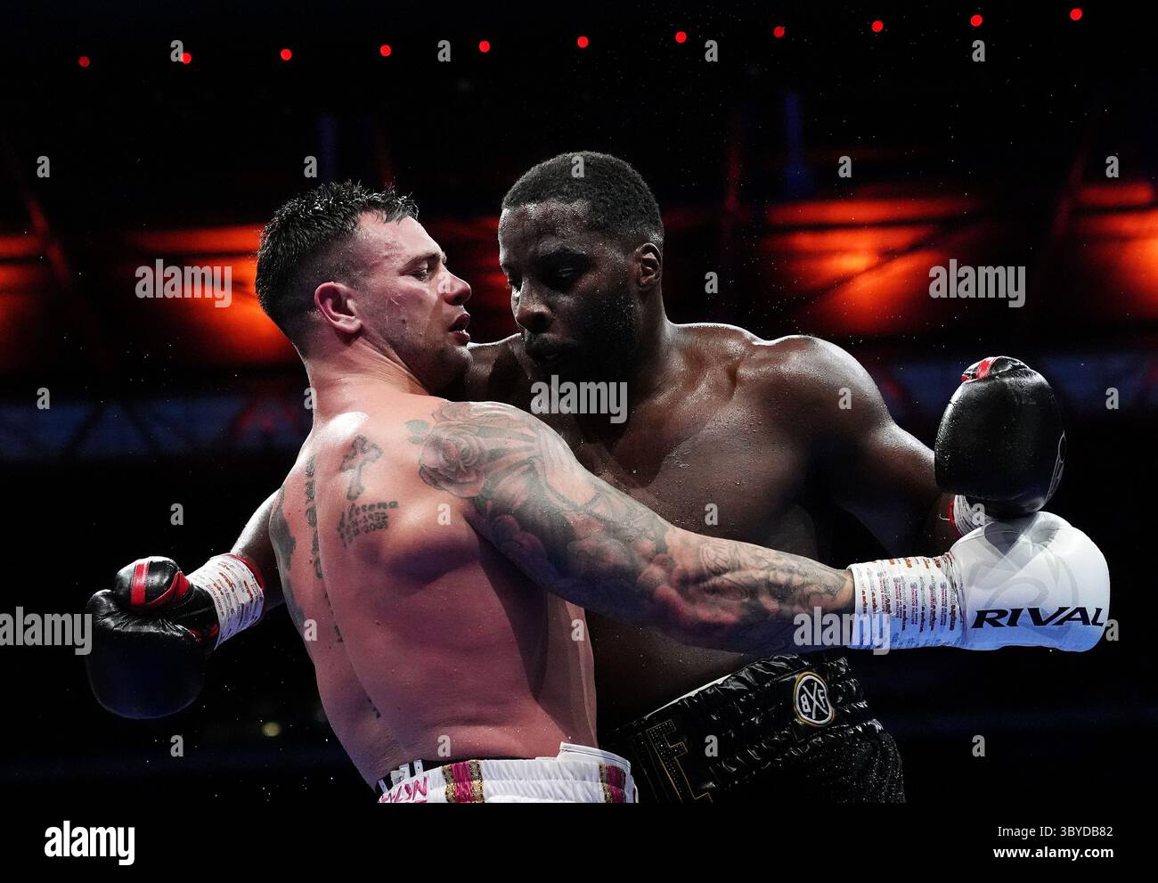 Lawrence Okolie (right) and Kevin Lerena in action during their WBC ...
