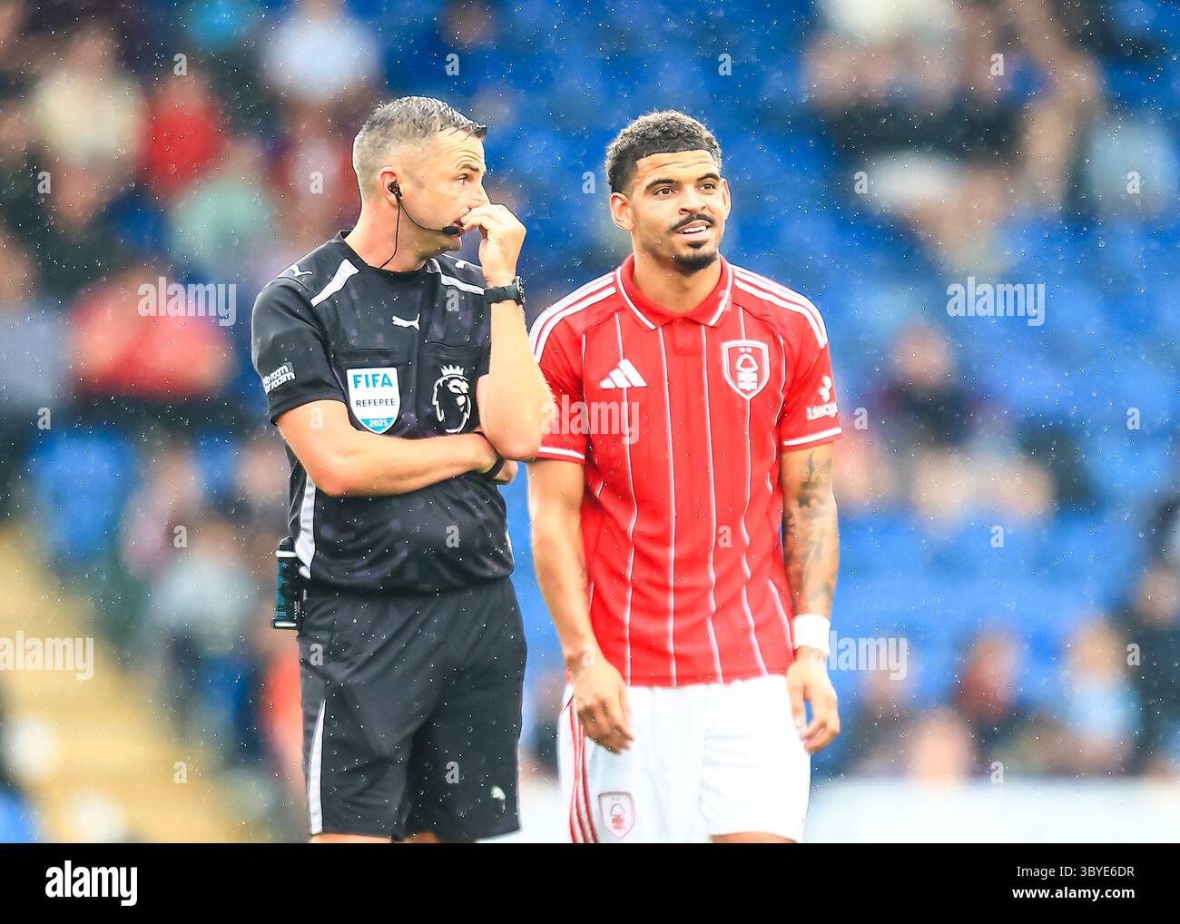 referee Michael Oliver and Morgan Gibbs-White of Nottingham Forest ...