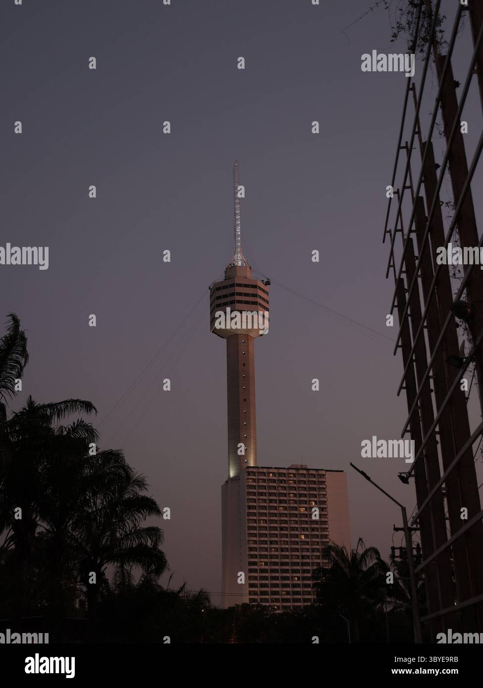 The Iconic Tower at Dusk Features an Urban Backdrop That Captivates All ...