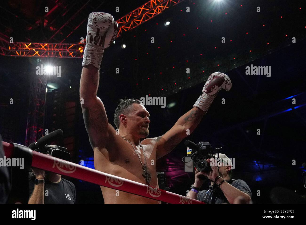 Ukraine's Oleksandr Usyk celebrates winning the undisputed world ...