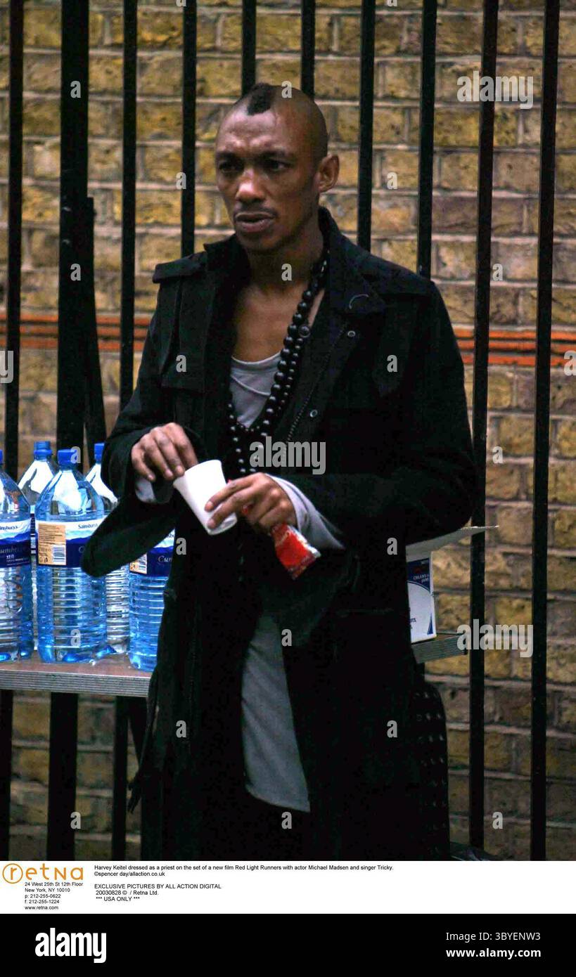 Harvey Keitel dressed as a priest on the set of a new film Red Light ...