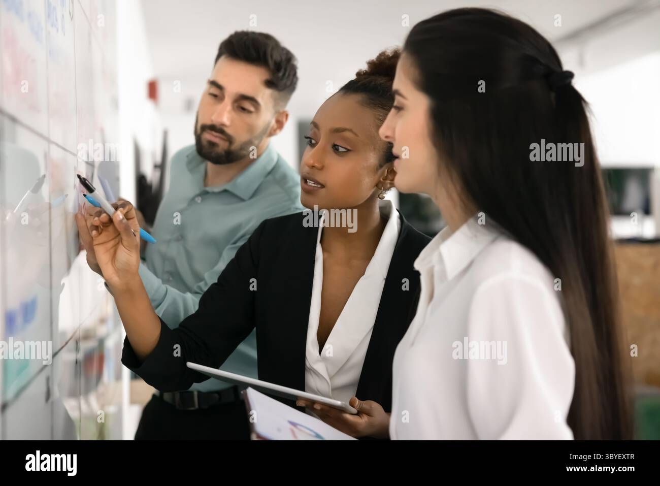 Diverse group workmates talking hi-res stock photography and images - Alamy