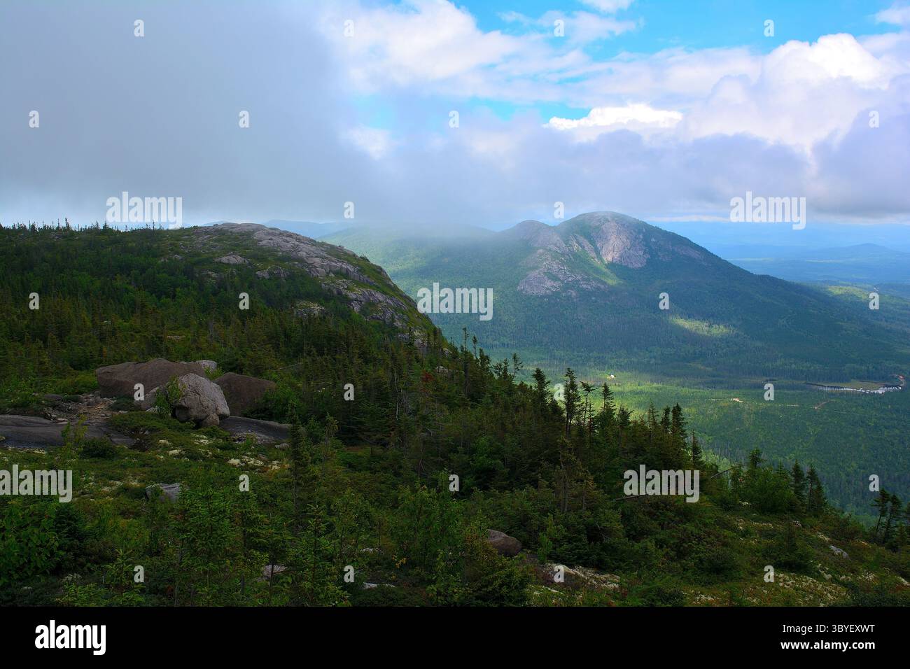 Clouds passing mountains forest hi-res stock photography and images - Alamy