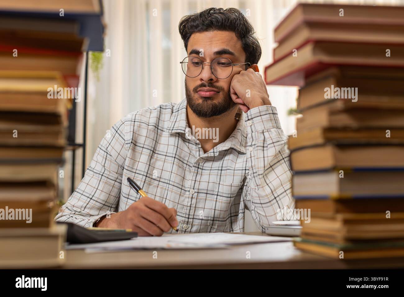 Exhausted indian businessman reviewing hi-res stock photography and ...