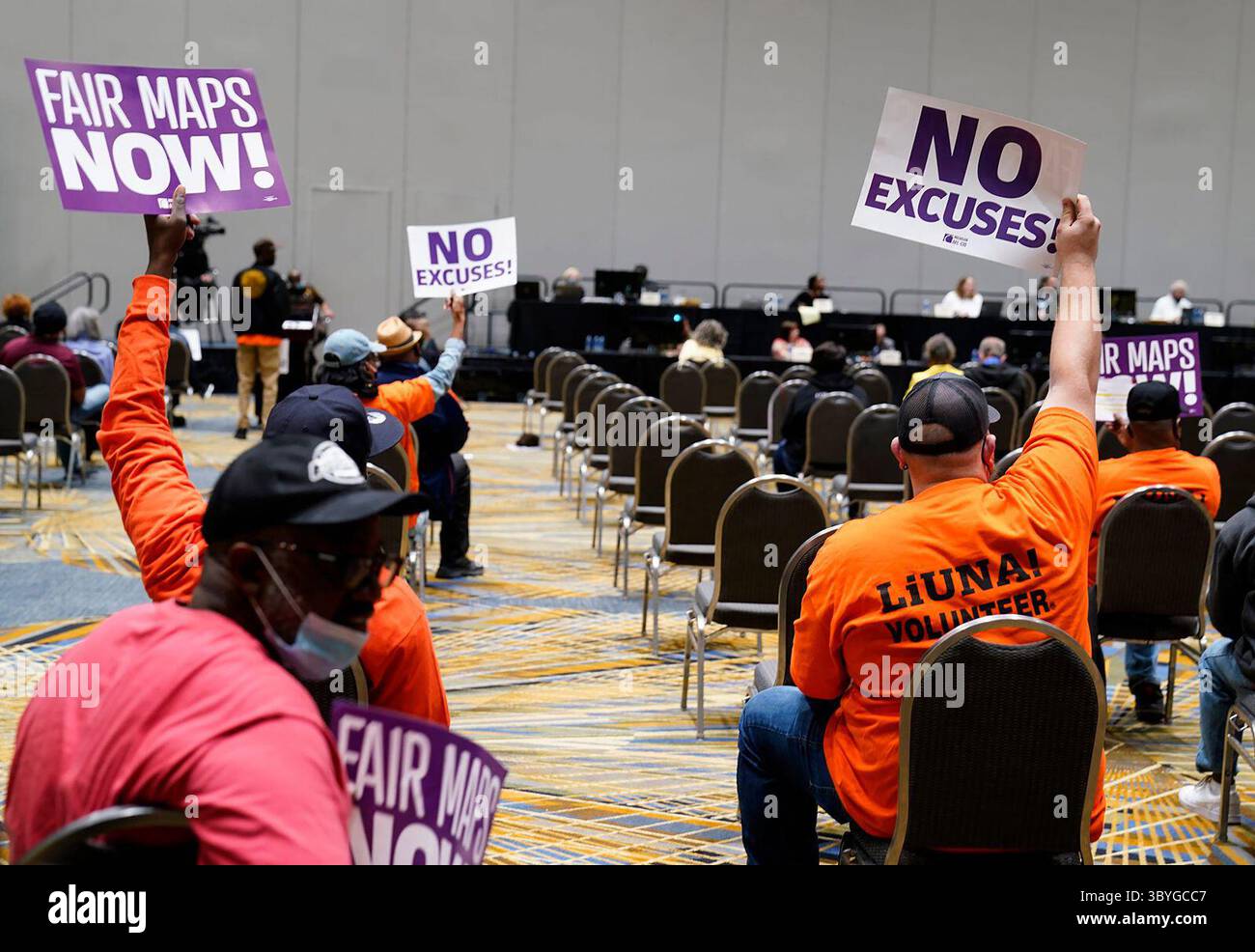 October 22, 2021: Members of the metro Detroit community hold signs ...