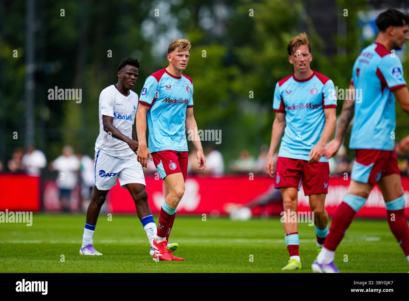 Rotterdam - Hyllarion Goore of KAA Gent, Jan Plug of Feyenoord during a ...