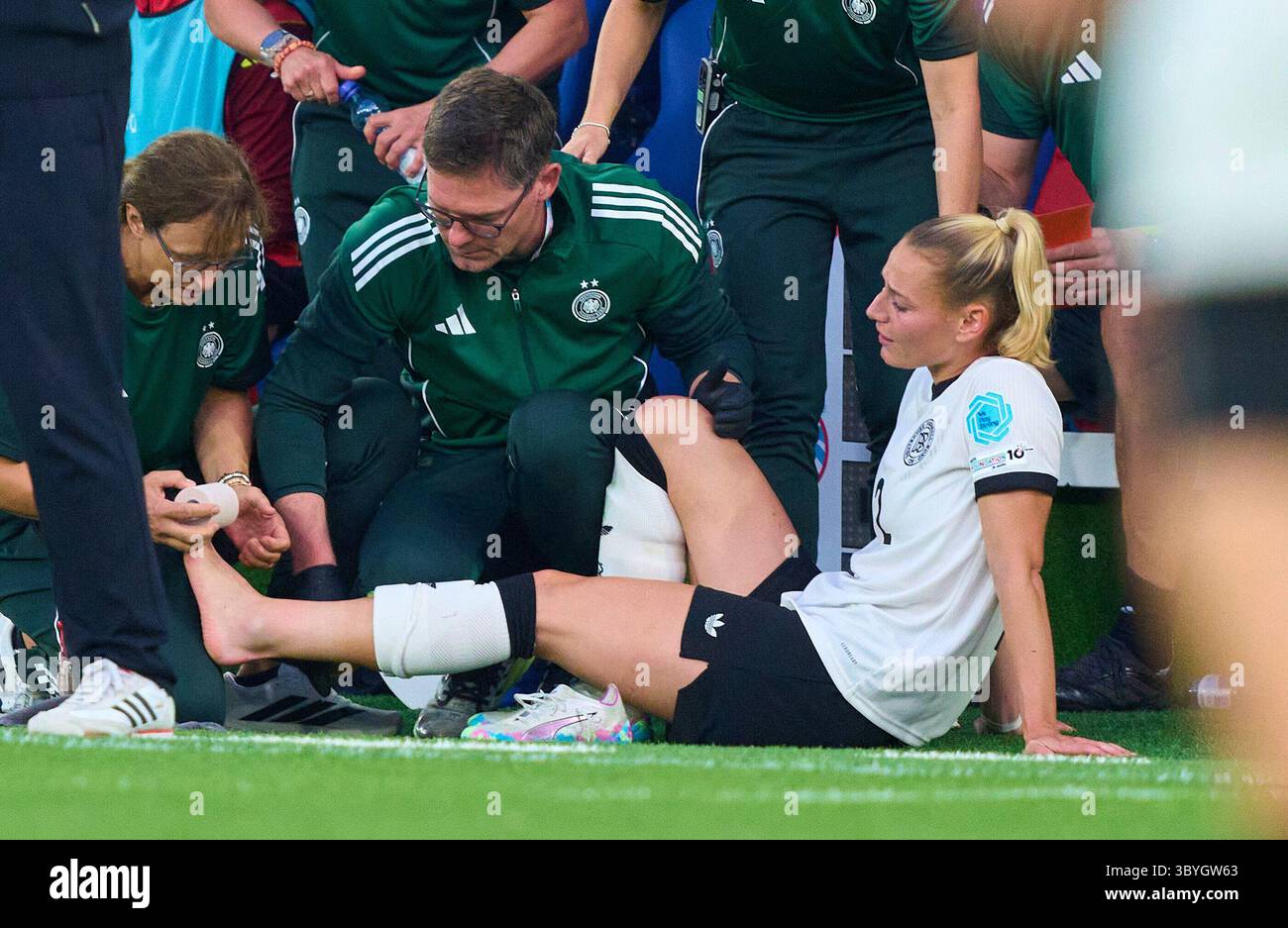 Sarai Linder #2 of Team Germany ankle injury in the football quarter ...