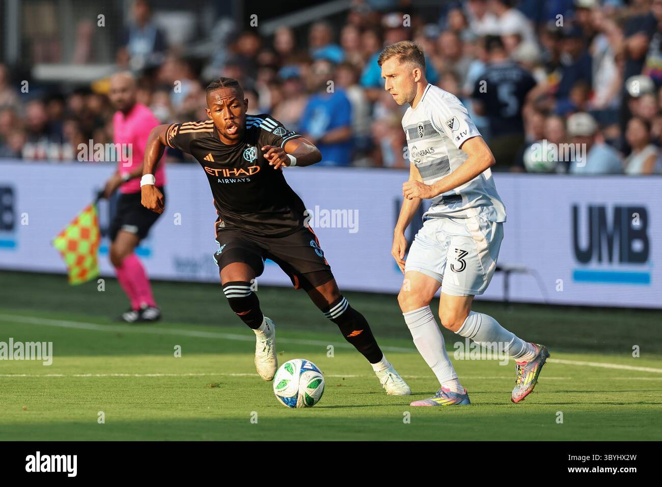 KANSAS CITY, KS - JULY 19: Andrés Perea #8 of New York City pursues ...