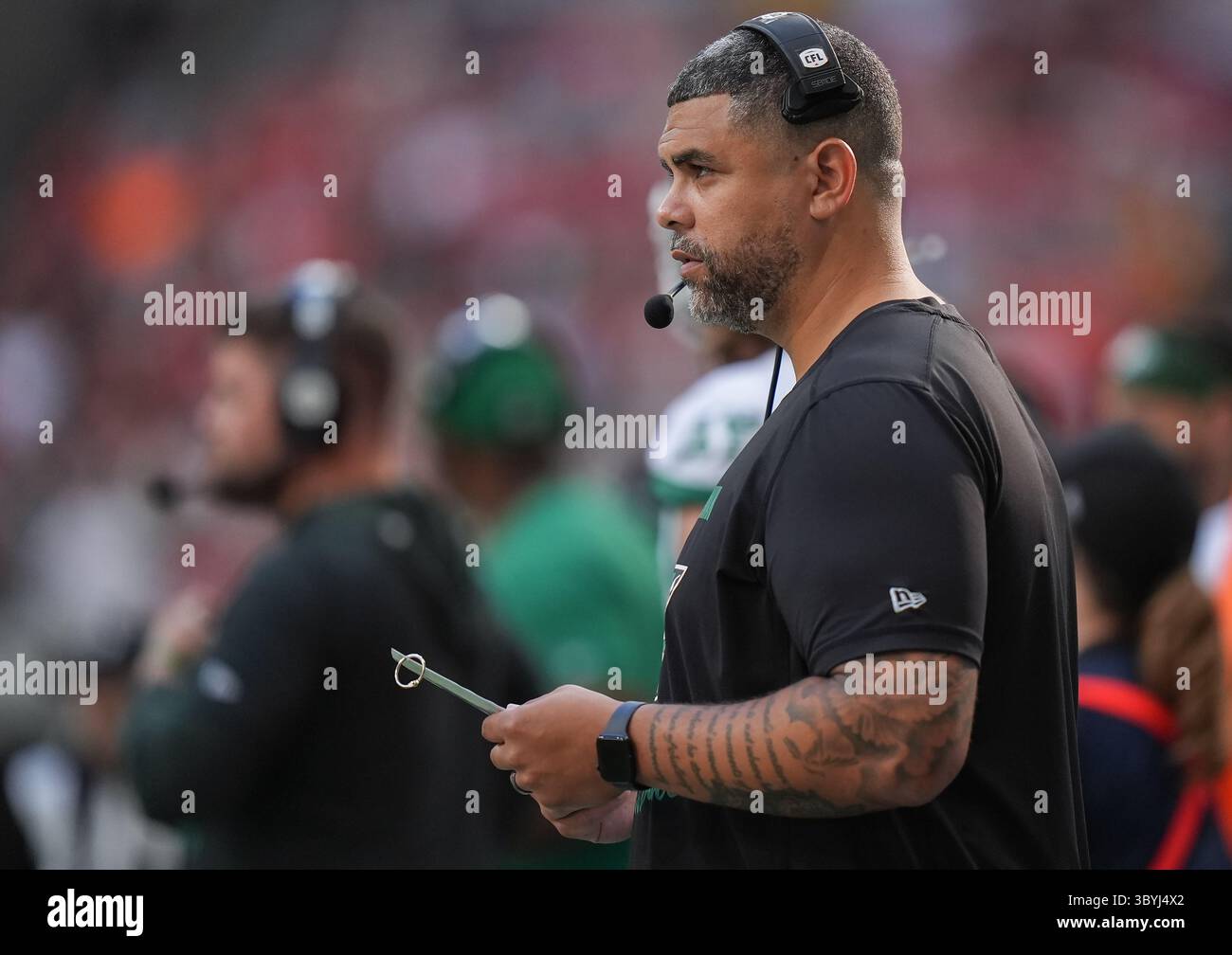 Saskatchewan Roughriders head coach Corey Mace stands on the sideline ...