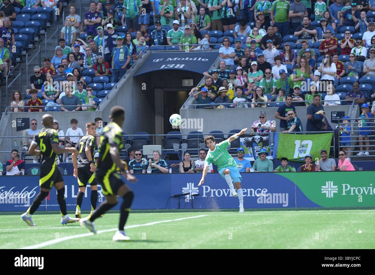 Seattle Sounders FC forward Paul Rothrock (14) crosses the ball during ...