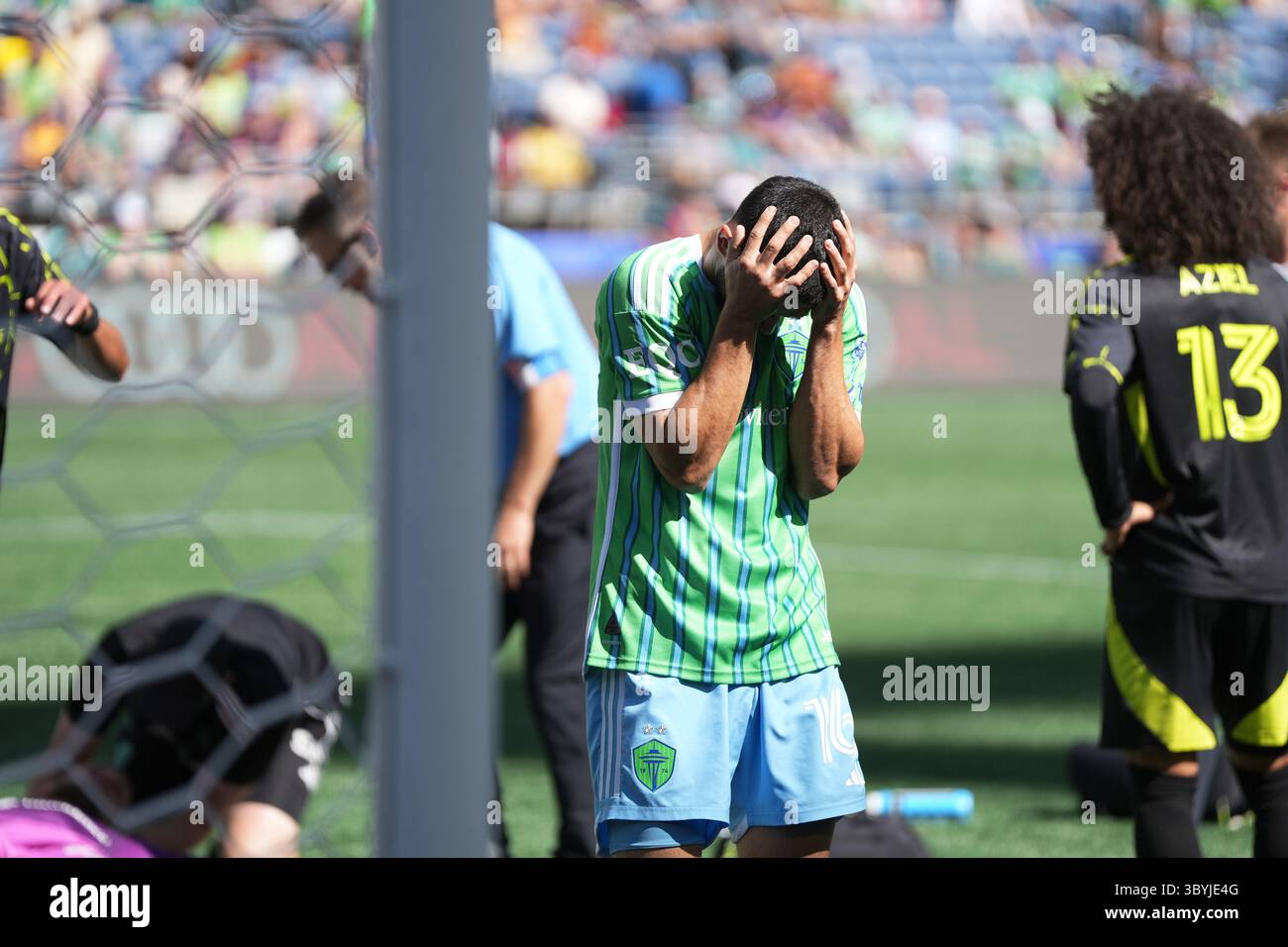 Seattle Sounders FC defender Alex Roldan (16) reacts after an injury to ...