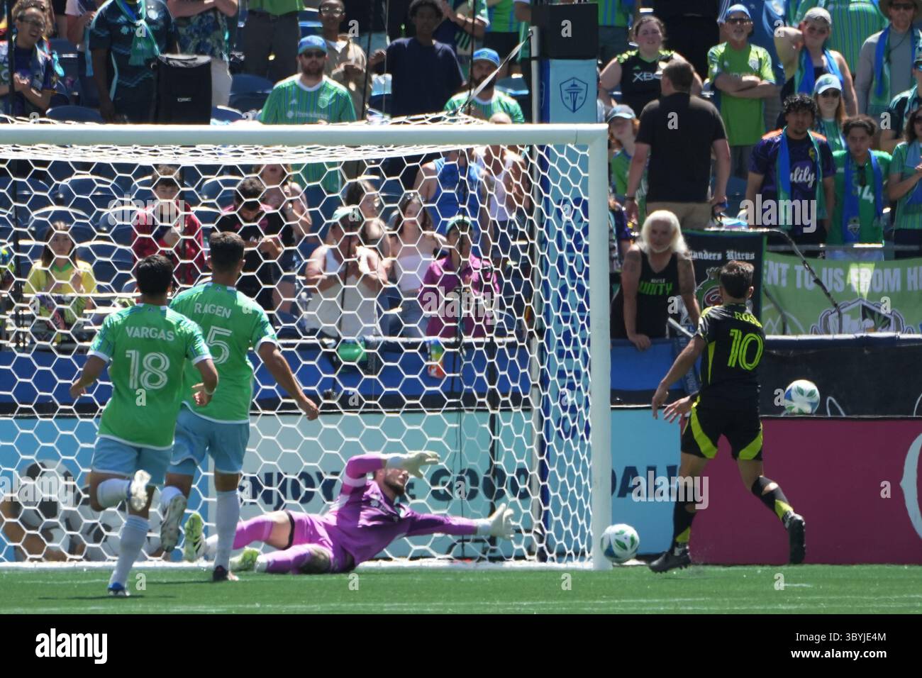 Columbus Crew forward Diego Rossi (10) takes a shot as Seattle Sounders FC goalkeeper Stefan ...