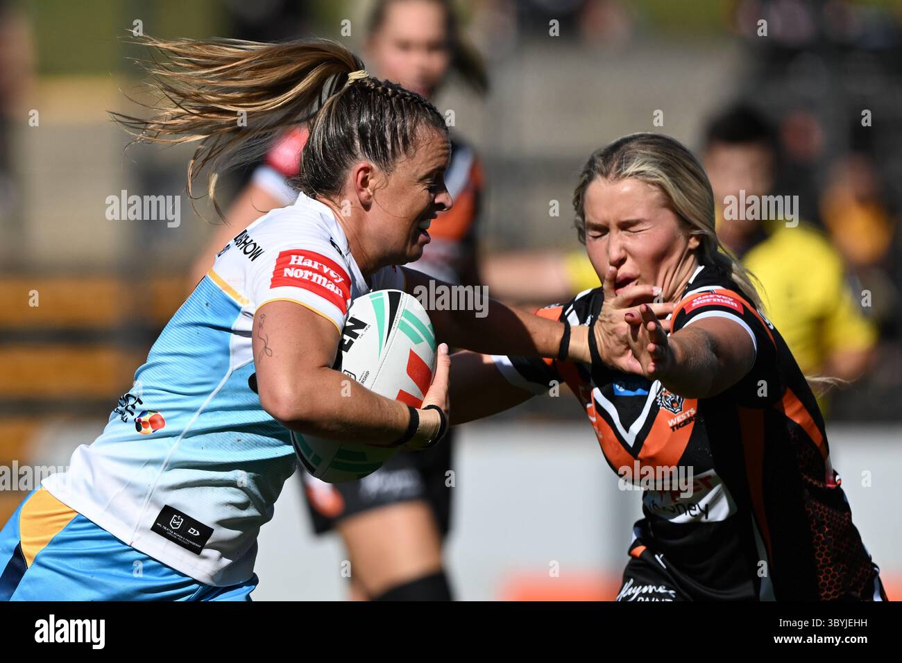 Sydney, Australia. 20th July, 2025. Lauren Brown of the Titans fends of ...