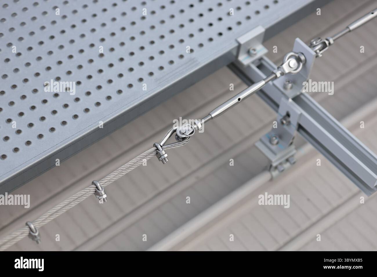 Lifeline system installed on the side of walkway. Lifeline systems are ...