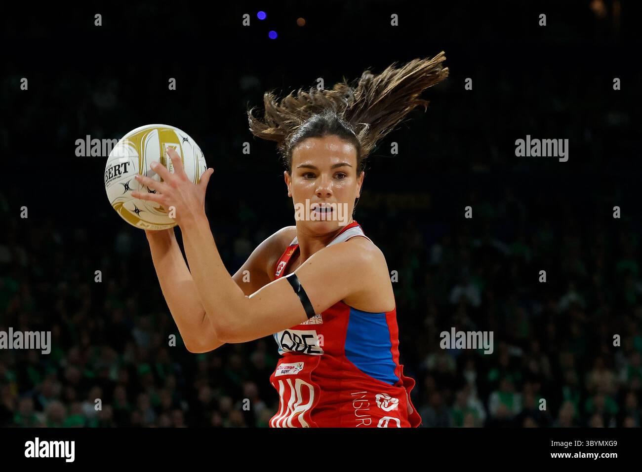 Grace Whyte of the Swifts receives the ball during the Super Netball ...