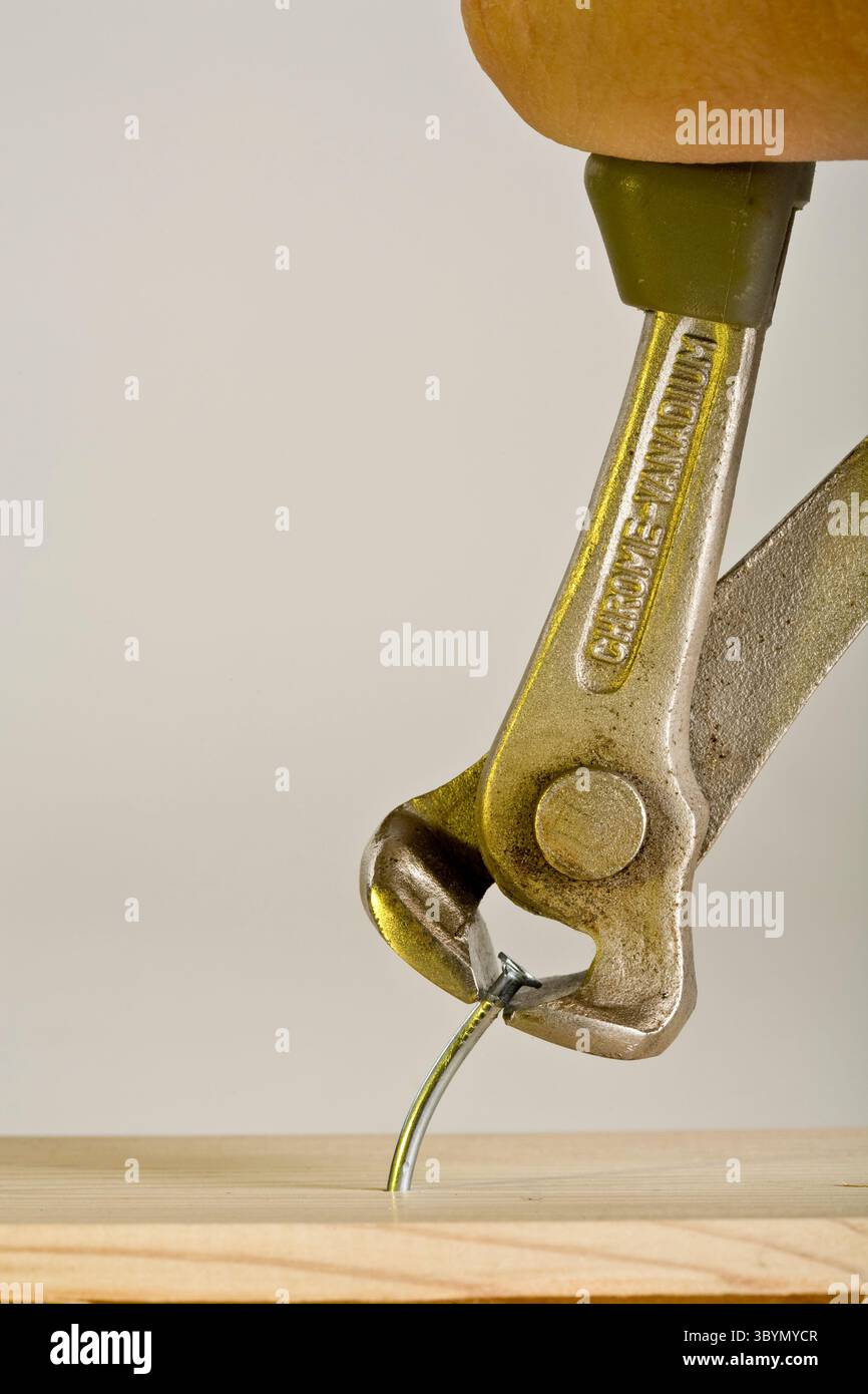 Hand pulling out metal hi-res stock photography and images - Alamy