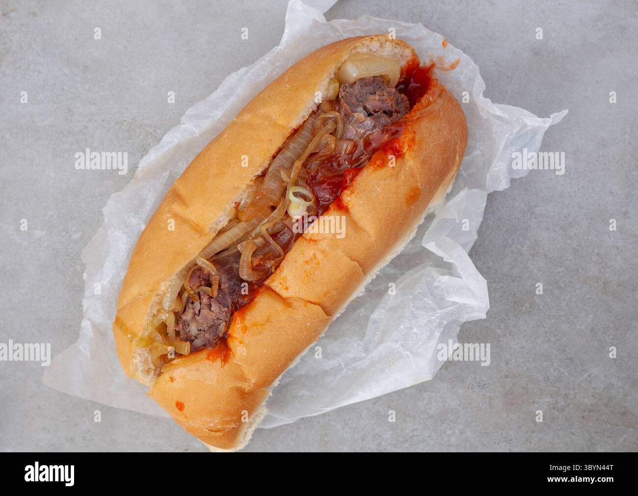 flat lay image of one traditional South African Boerewors roll on a ...