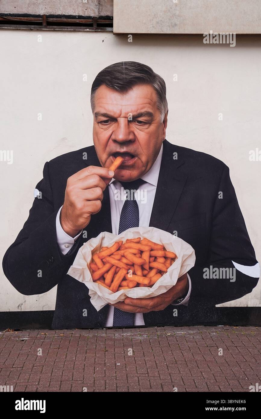 A mural of former England football manager Sam Allardyce eating orange ...