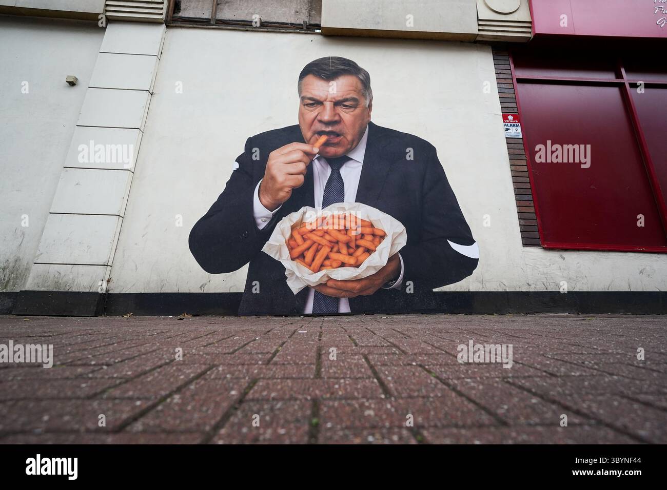A mural of former England football manager Sam Allardyce eating orange ...