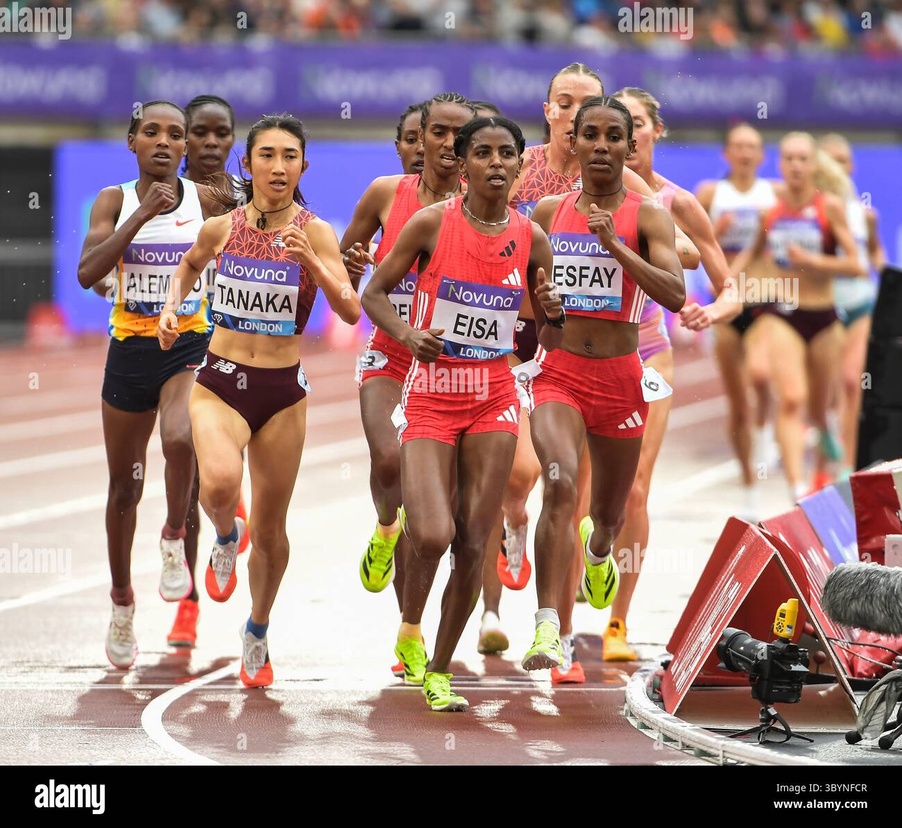 Nozomi Tanake of Japan, Fotyen Tesfay and Medina Eisa of Ethiopia ...
