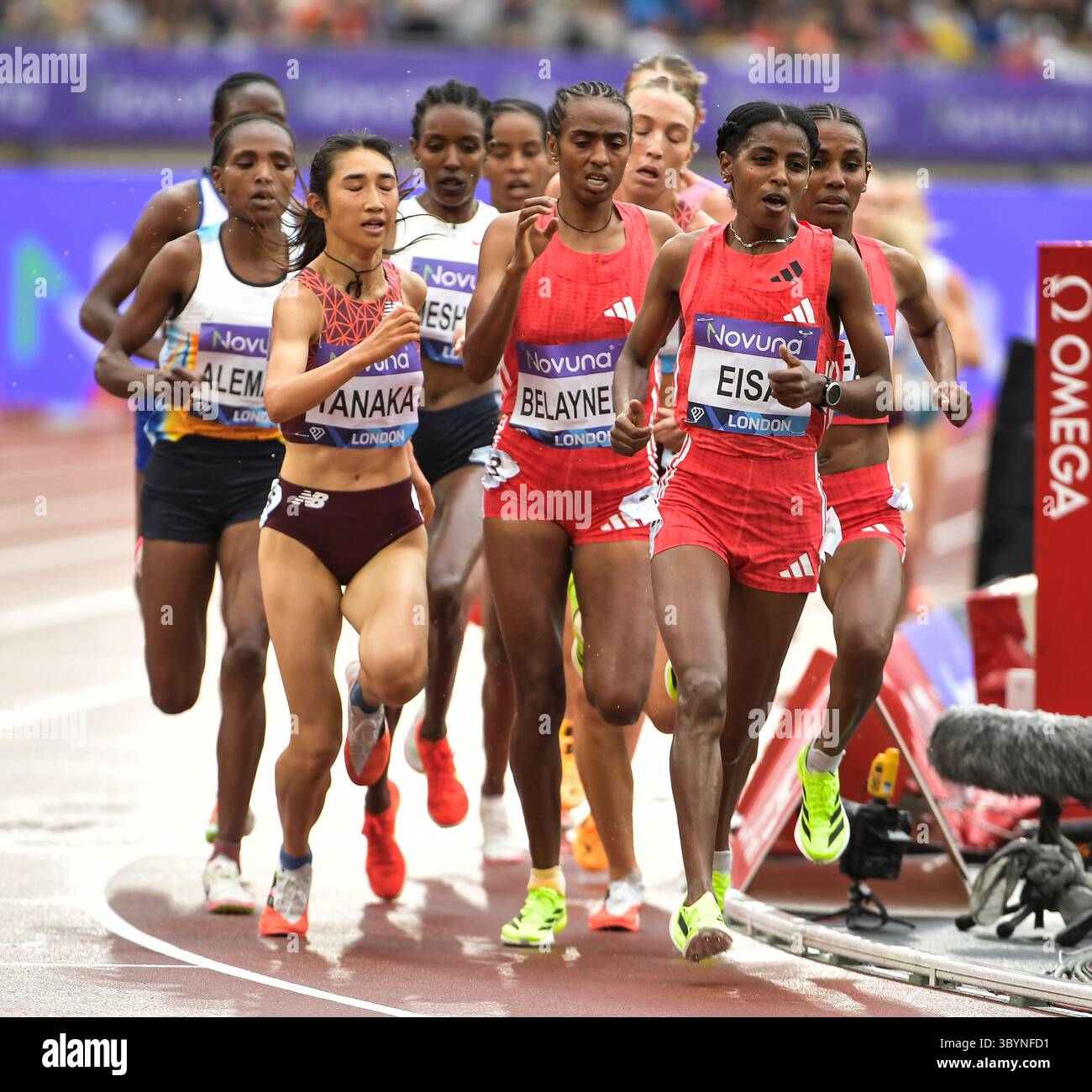 Nozomi Tanake of Japan, Fotyen Tesfay and Medina Eisa of Ethiopia ...