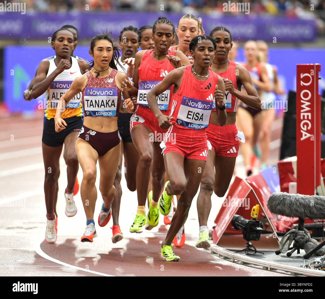 Nozomi Tanake of Japan, Fotyen Tesfay and Medina Eisa of Ethiopia ...