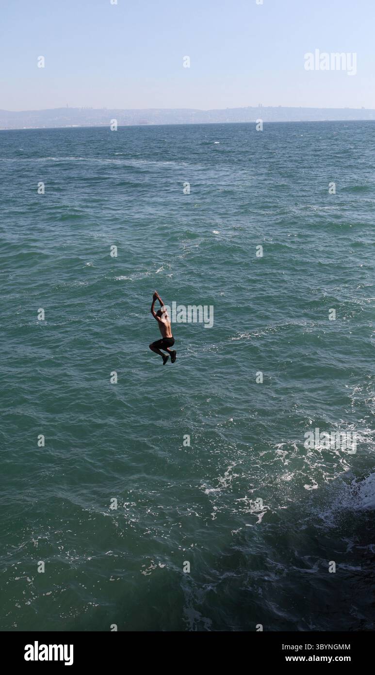Daredevil young man jumps hi-res stock photography and images - Alamy