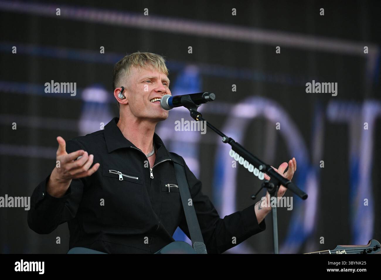 Mother Mother, Ryan Guldemond performs during the Lollapalooza 2025 ...