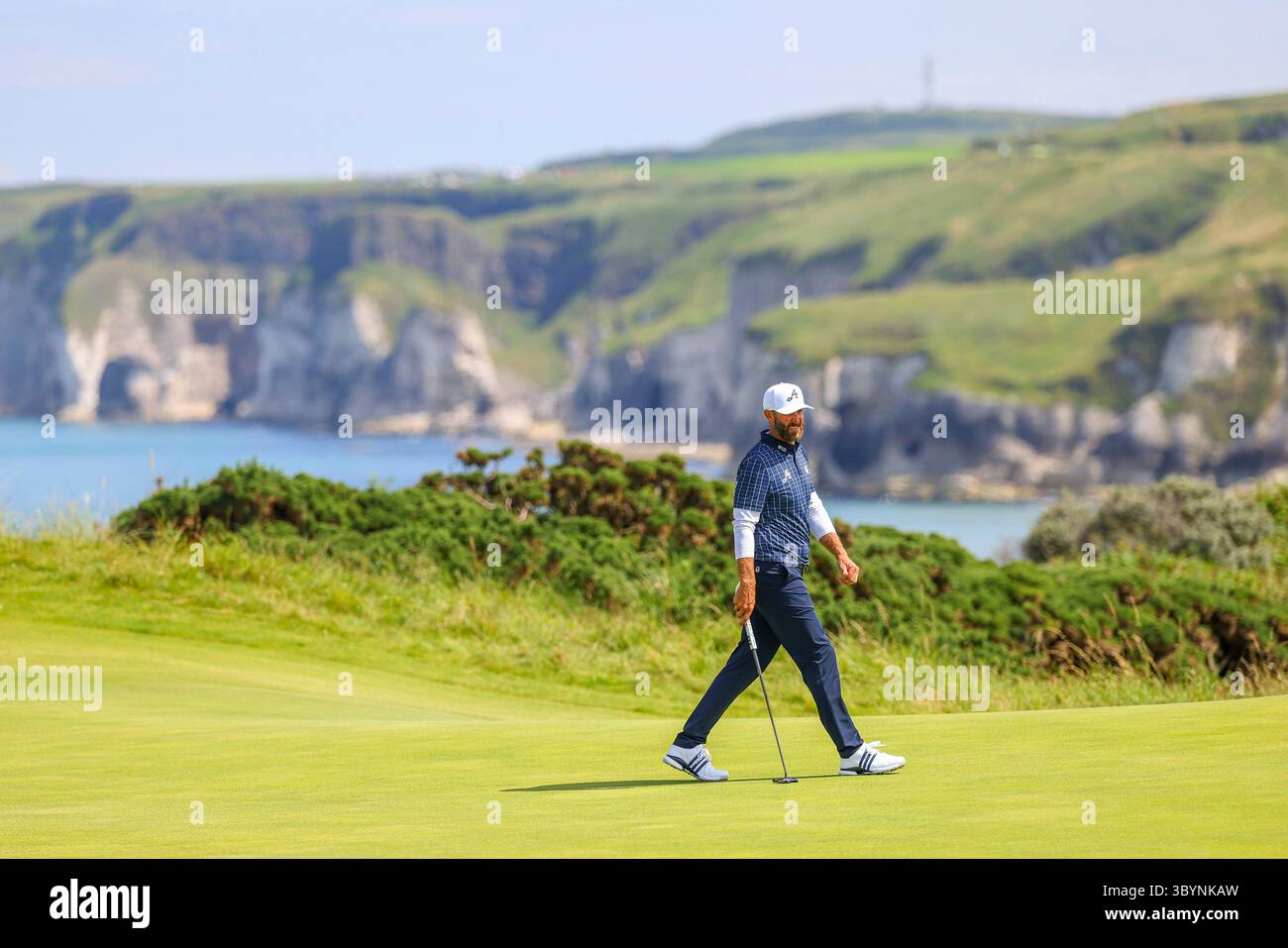 Captain Dustin Johnson of 4Aces GC walks on the fifth green during the ...