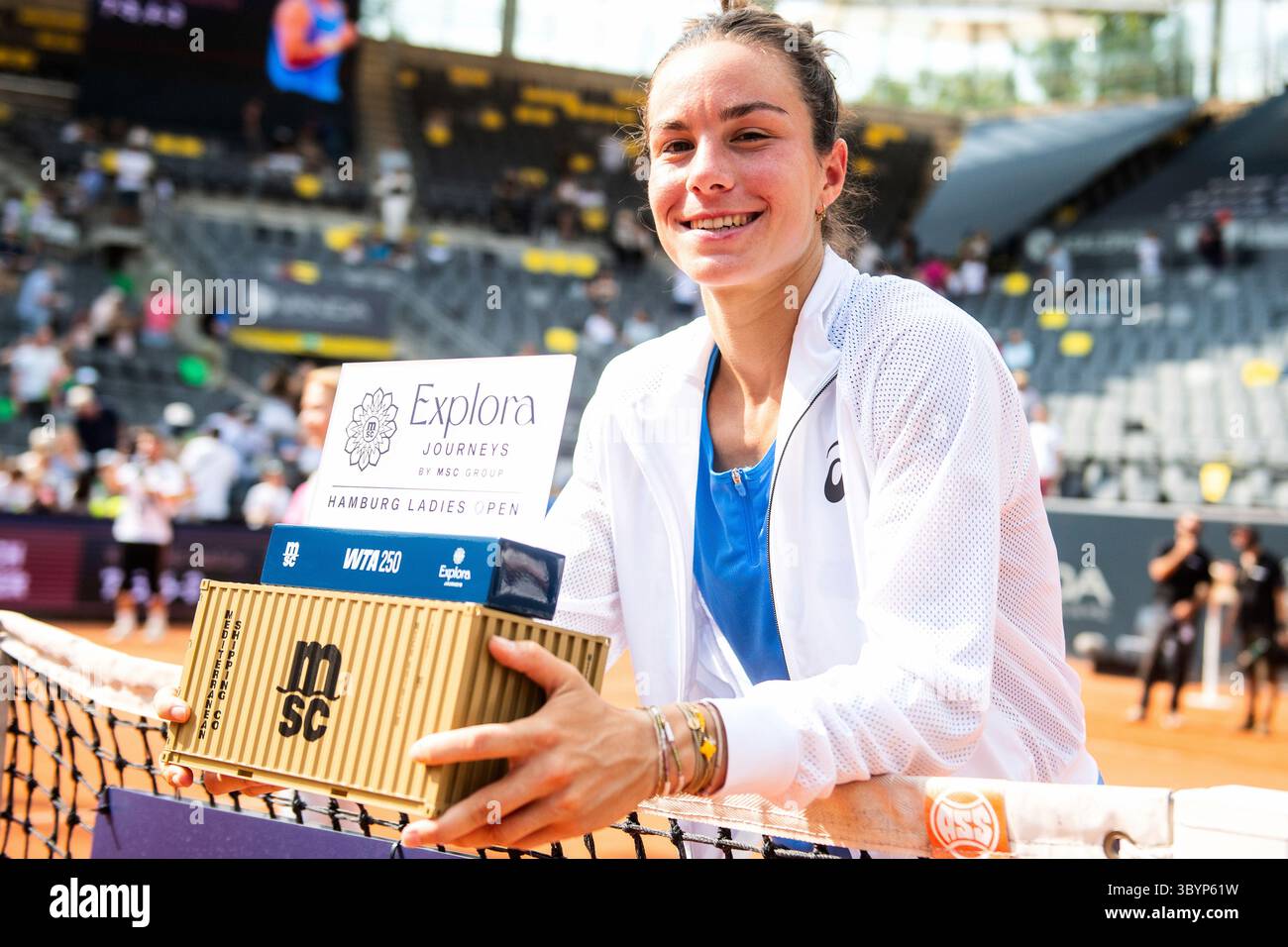 France's Lois Boisson poses with the trophy after winning the WTA Hamburg tennis tournament ...
