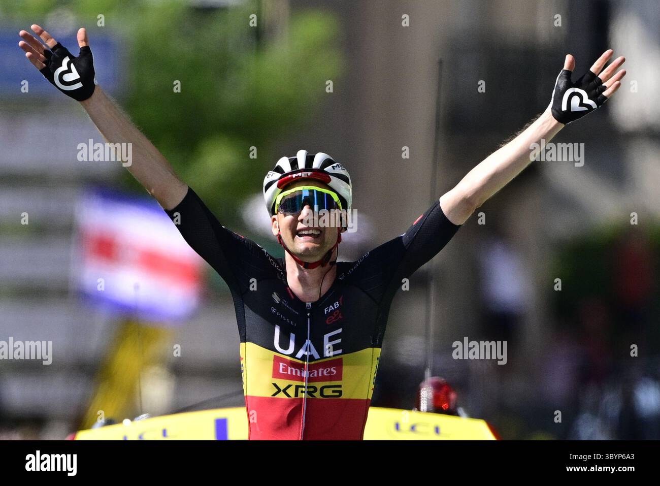 Belgian Tim Wellens of UAE Team Emirates and pictured winning the stage ...