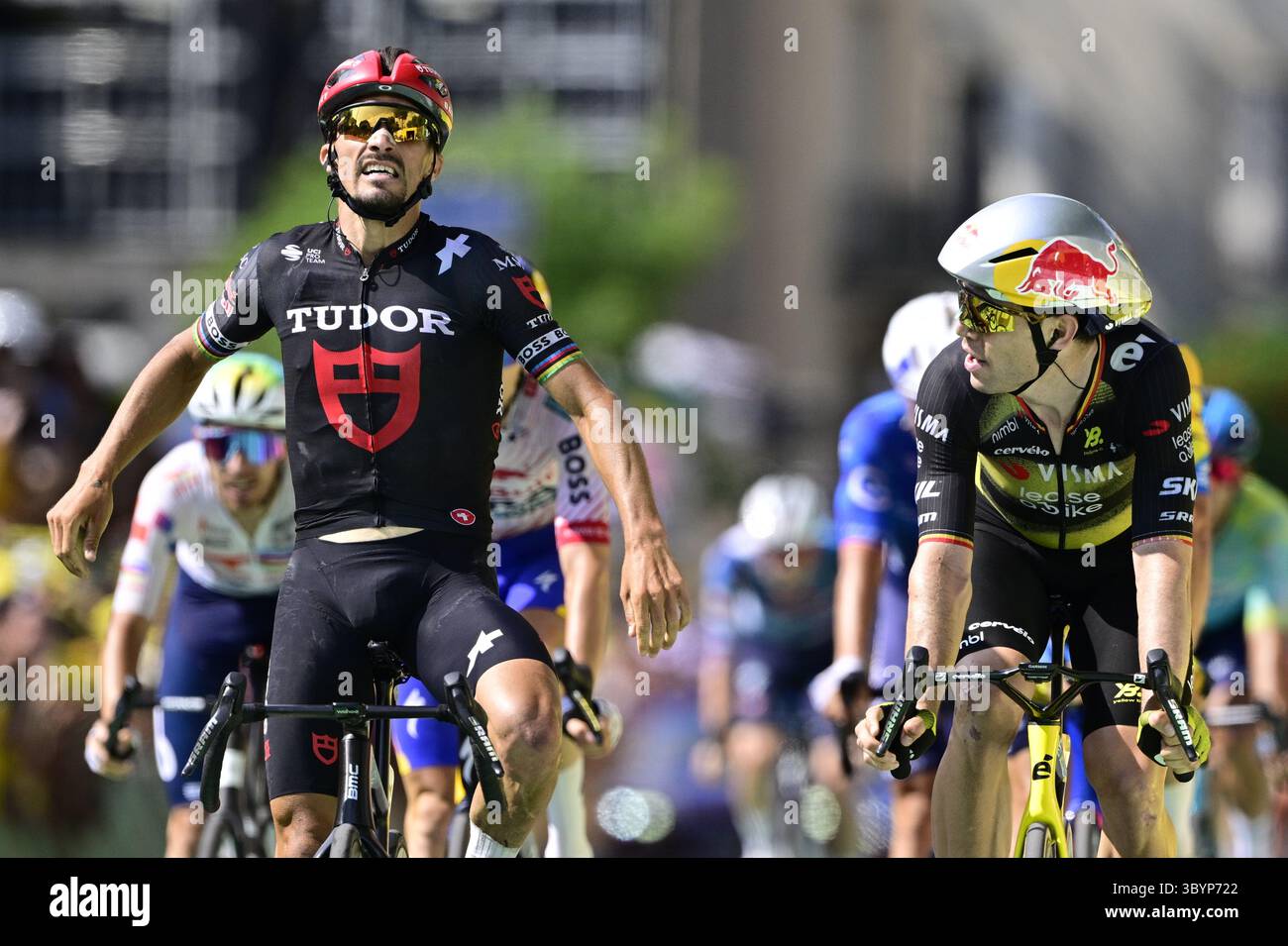 French Julian Alaphilippe of Tudor Pro Cycling Team, Belgian Wout van ...