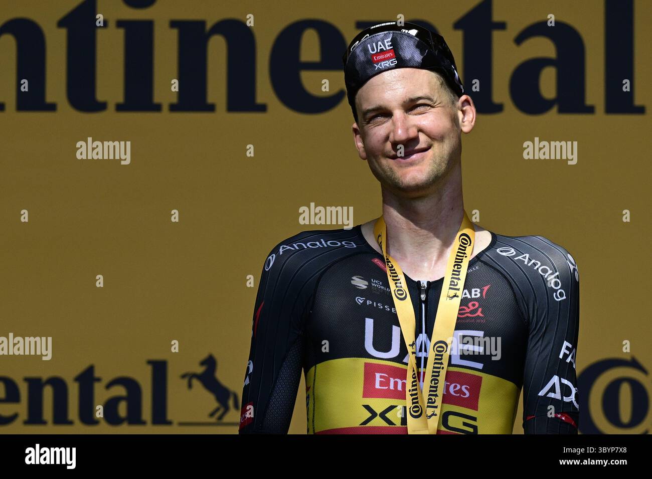Belgian Tim Wellens of UAE Team Emirates and pictured on the podium ...