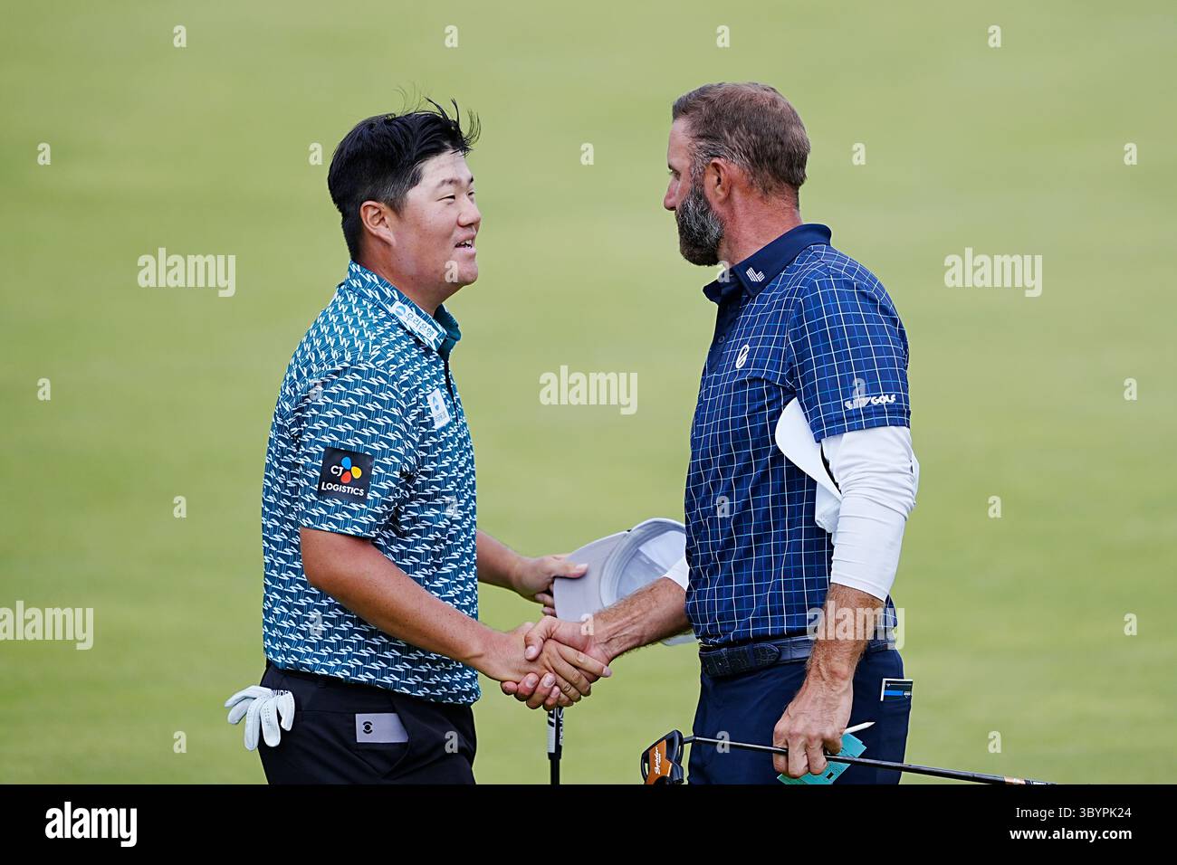 USA's Dustin Johnson (right) shake hands with South Korea's Sungjae Im ...