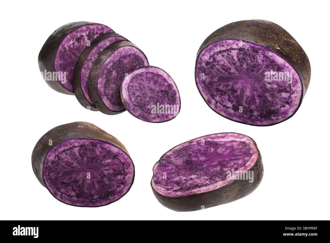 Purple potato (Solanum tuberosum), halved and partially sliced tubers ...