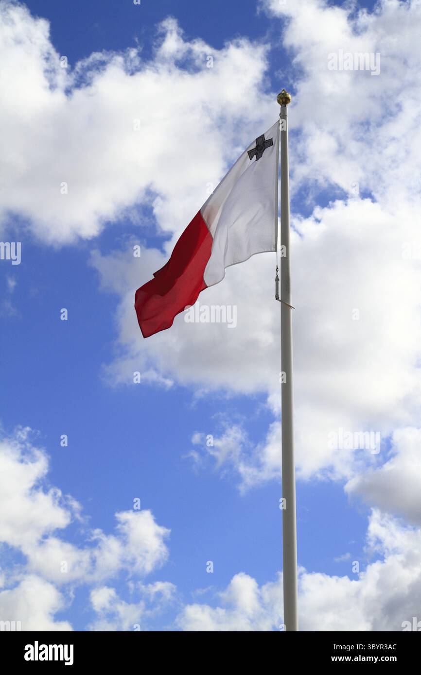 Flag of Malta on the pole waving in the wind, Valletta, Malta Stock ...