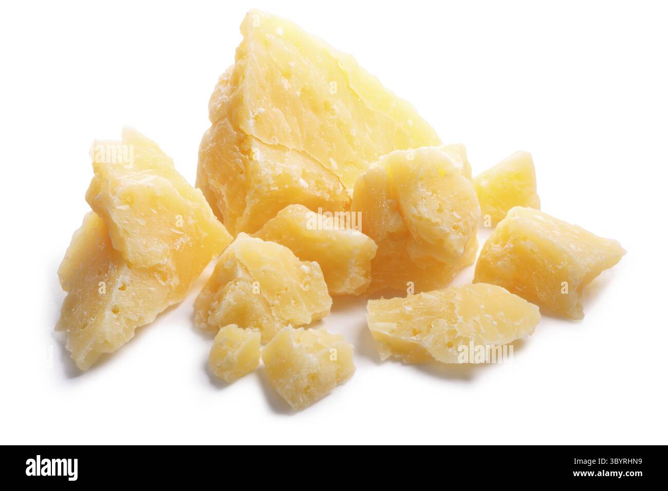 Pile of hard grainy mature cheese (Parmesan, Parmigiano), rough pieces ...