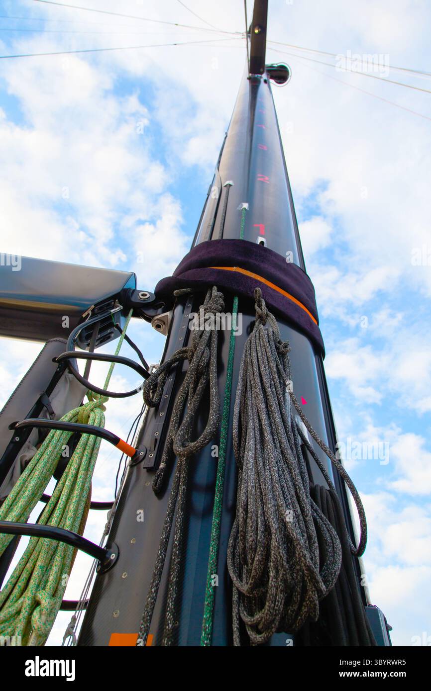 Mast of a sailing yacht without a sail. View from below Stock Photo - Alamy