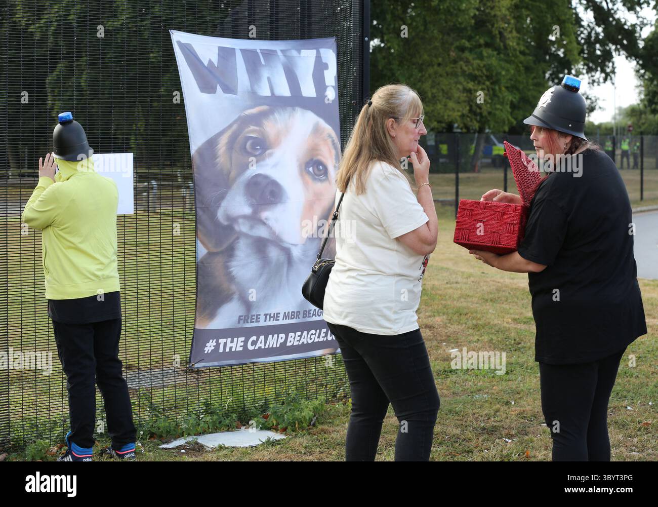 Protesters start to gather outside police headquarters with hats and a ...