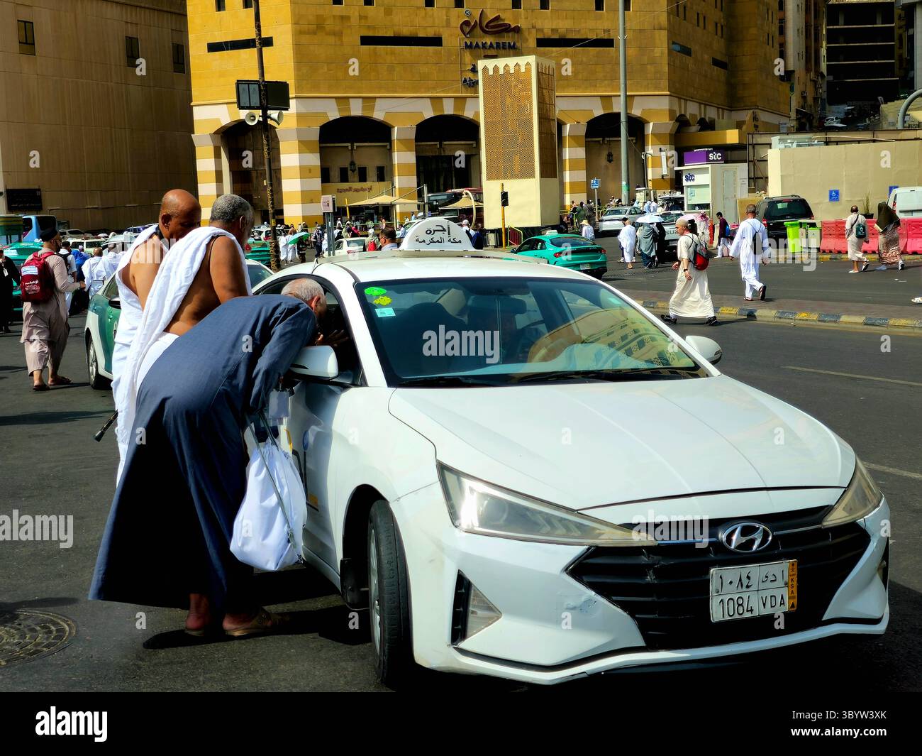 Mecca, Saudi Arabia, June 10 2024: Mecca Makkah Taxi, used to transport Hajj pilgrims inside and ...