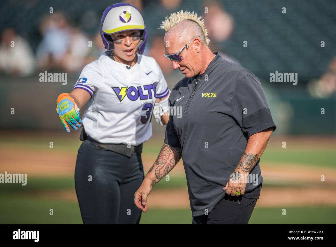 July 17, 2025: Volts head coach Kelly Kretschman, right, speaks with ...