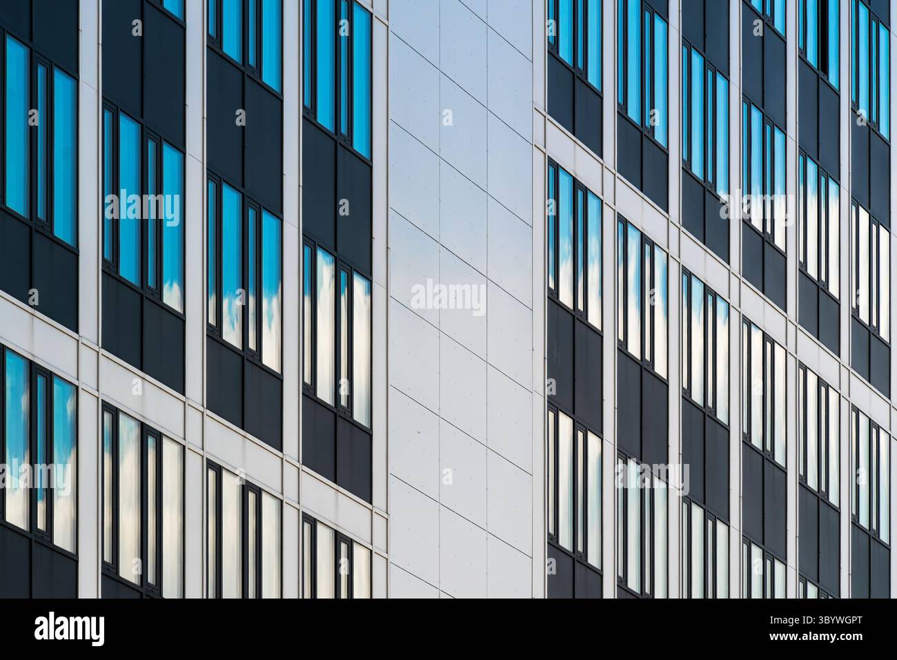 Contemporary office building with curtain wall and sharp window ...