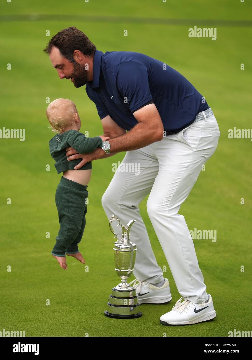 USA's Scottie Scheffler and his son Bennett celebrate victory with the ...