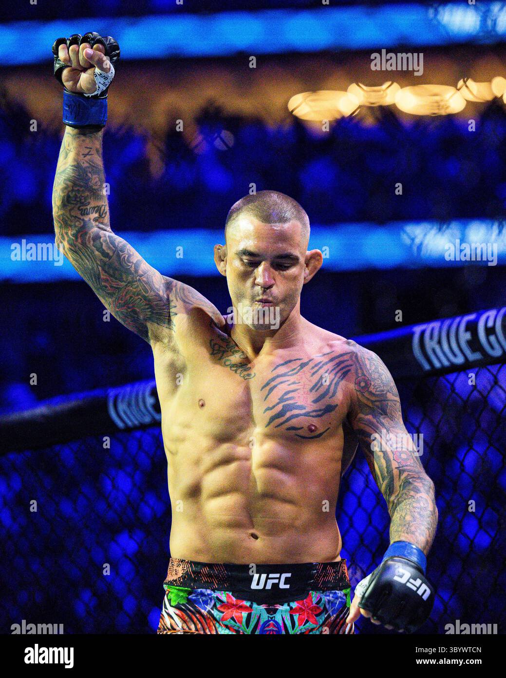 Dustin Poirier enters the octagon for the lightweight title at UFC 318 ...