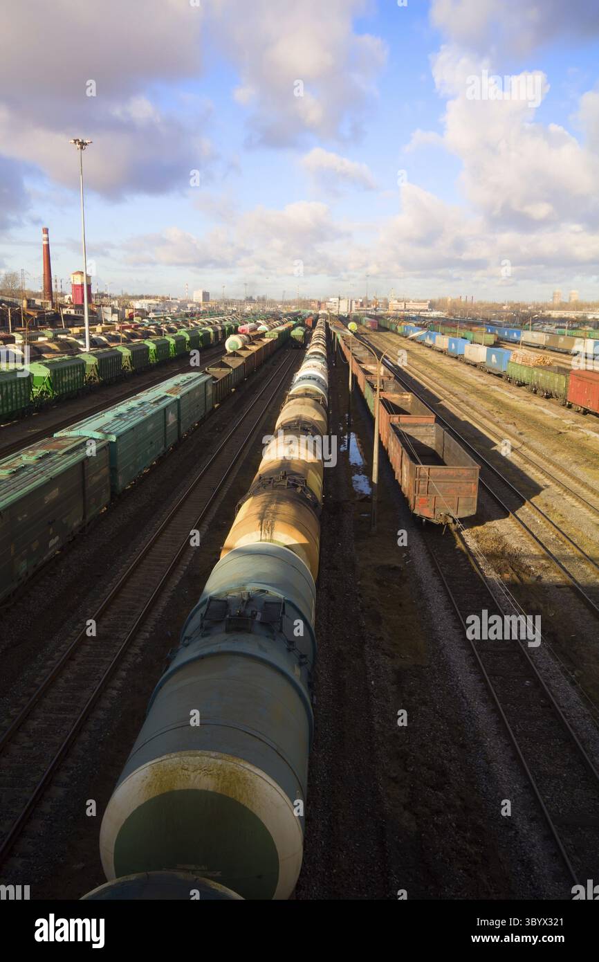 Freight train with color cargo containers in depot Stock Photo - Alamy
