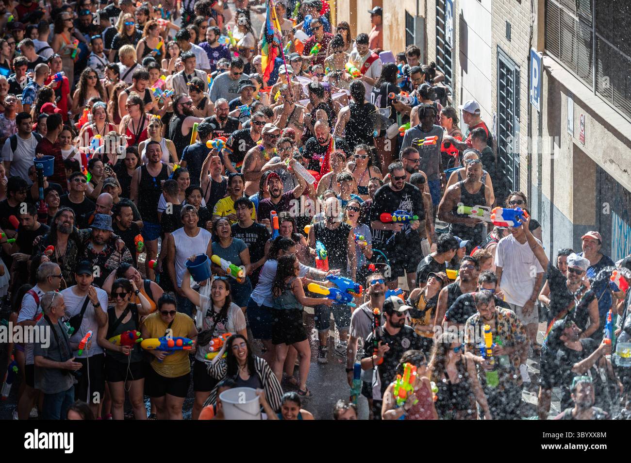 Revelers take part in the annual summer water fight celebrated in the ...
