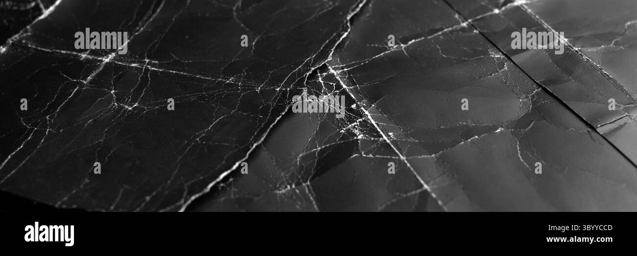 Black aged paper sheets with frayed creases and old worn wrinkles ...