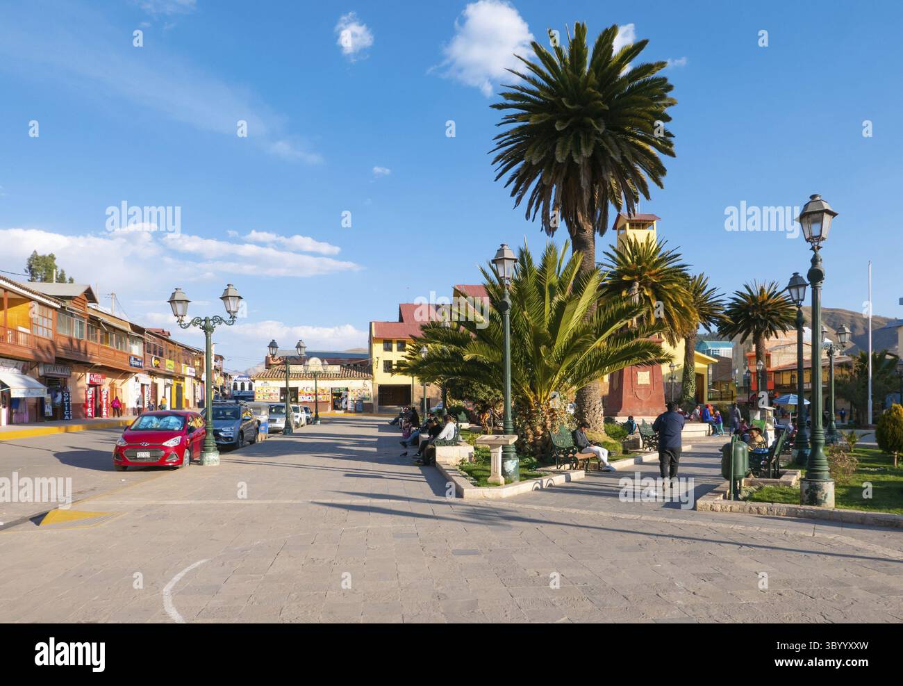 Sicuani Peru, August 16 public gardens with palm trees in Arms Square a ...