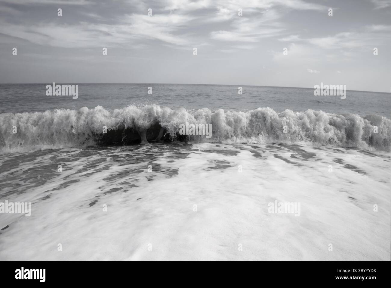 Strange sea effect in wave ocean beach Stock Photo - Alamy